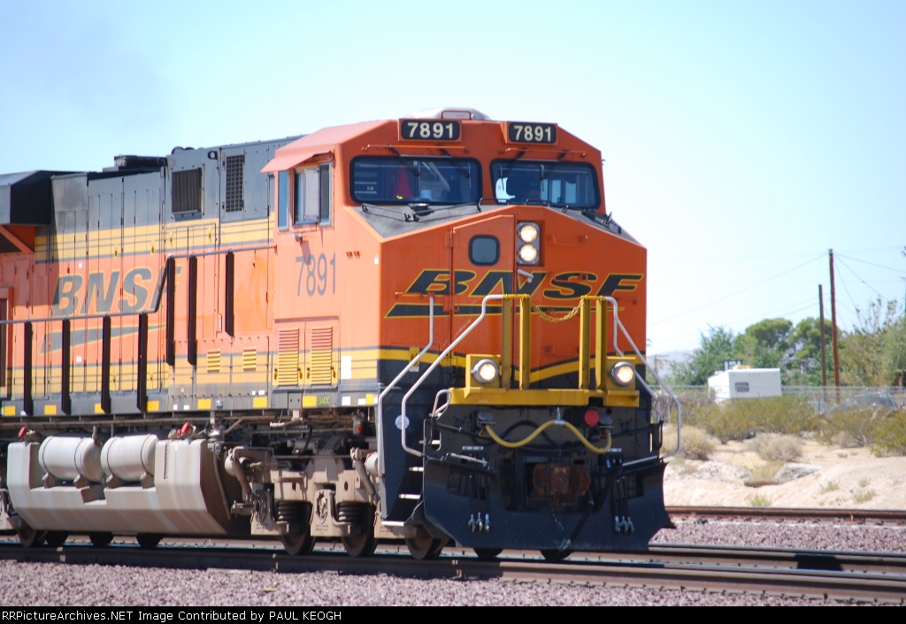 BNSF 7891 rolls east pulling a eastbound Z into the BNSF Barstow yard.